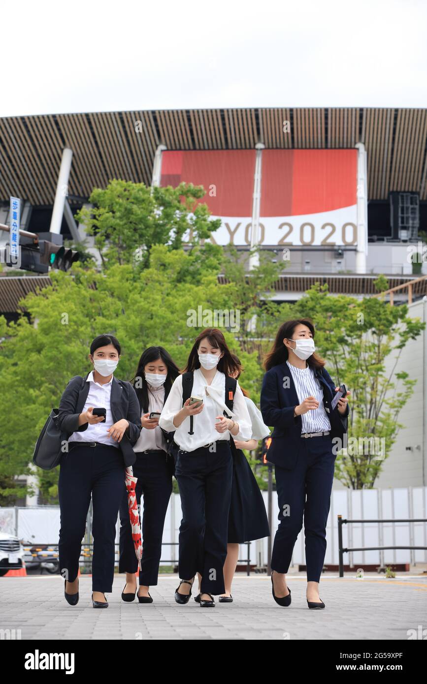 Tokyo, Japan. 25th June, 2021. Women with face masks as a preventive ...