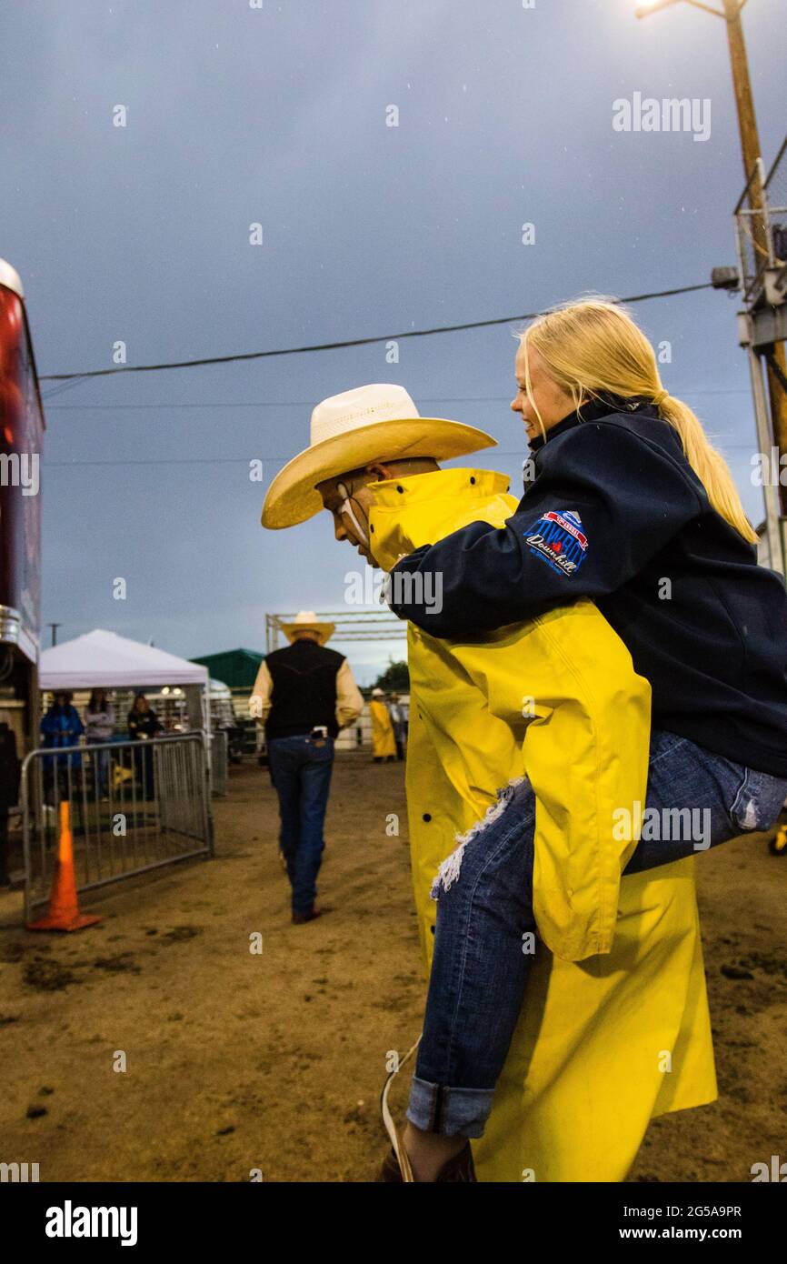 Reno, United States. 24th June, 2021. A rodeo clown takes time to offer ...