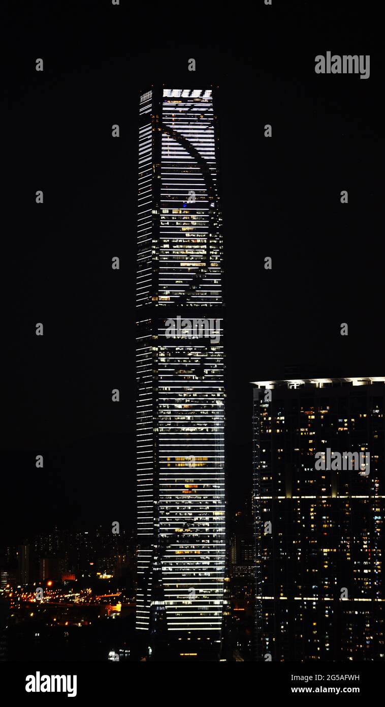 Illuminated ICC Tower in Hong Kong Stock Photo - Alamy