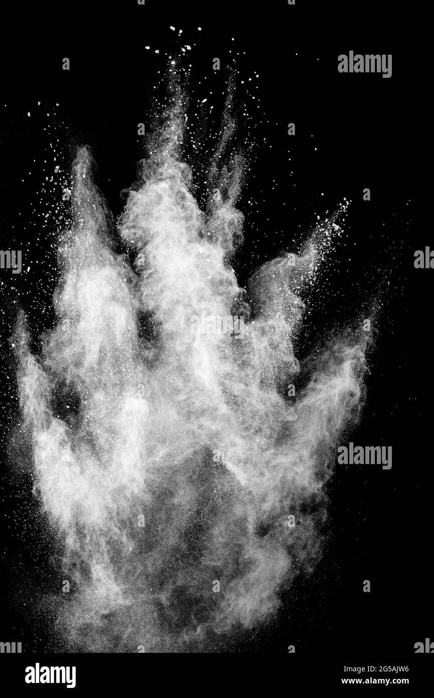White powder explosion clouds.Freeze motion of white dust particles ...