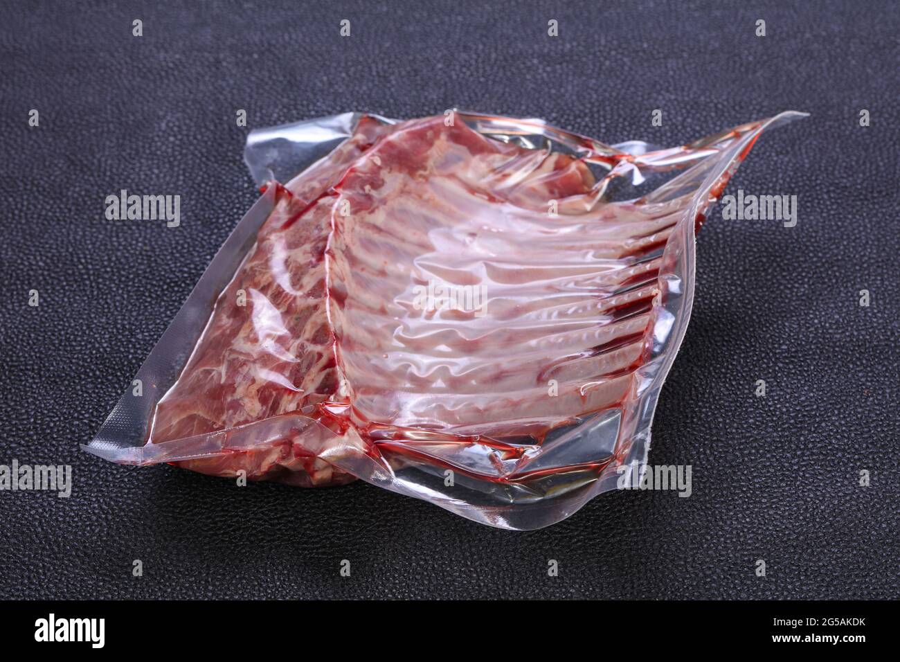 Raw rack of lamb in the pack Stock Photo - Alamy