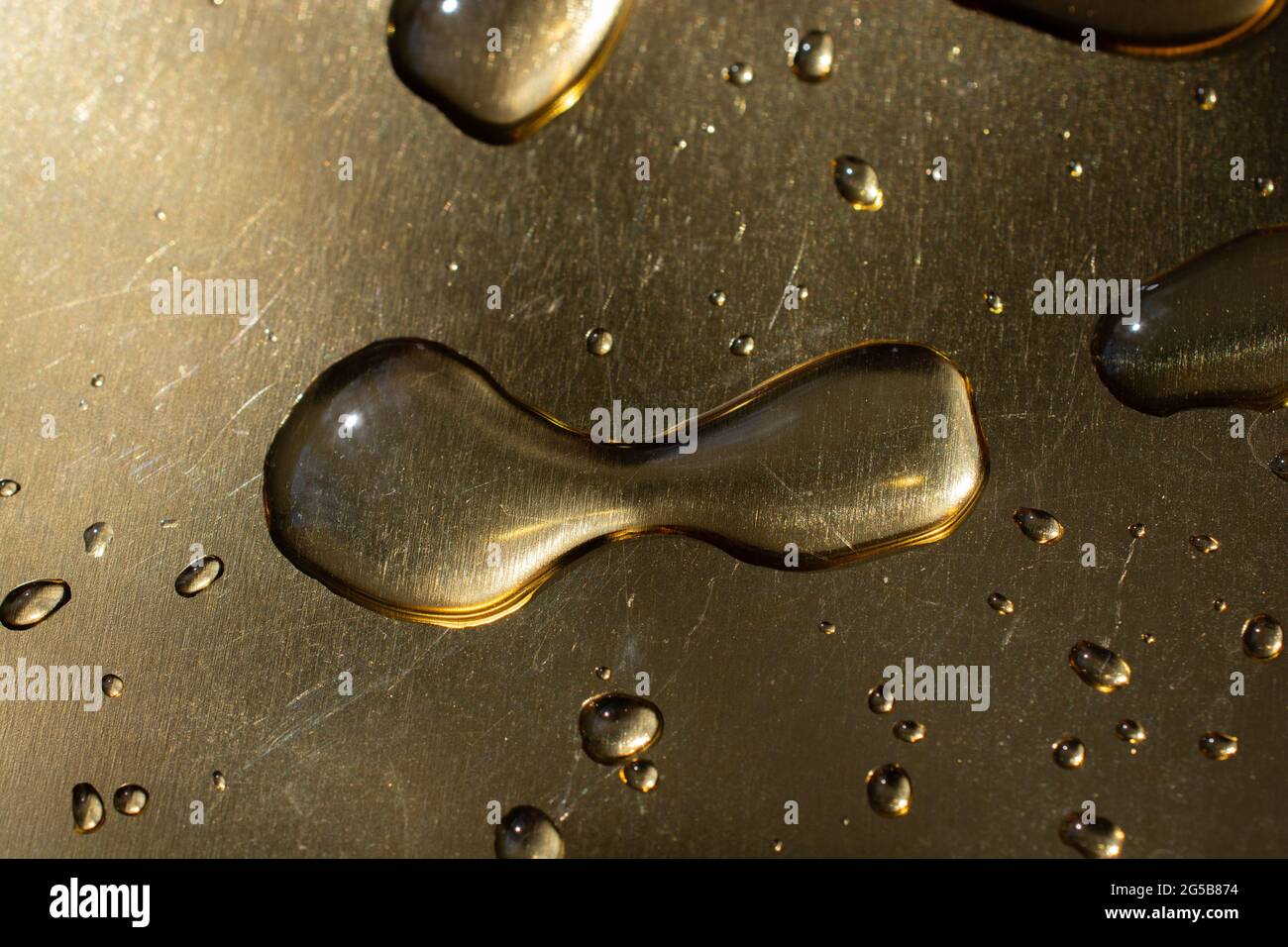 Oil drops liquid splash hi-res stock photography and images - Alamy