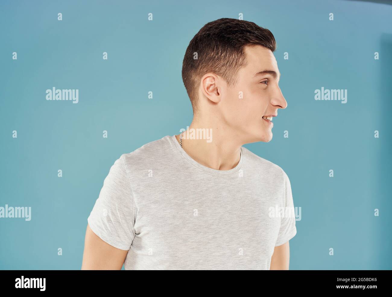 handsome man holding hands in front of him emotions of joy Stock Photo ...