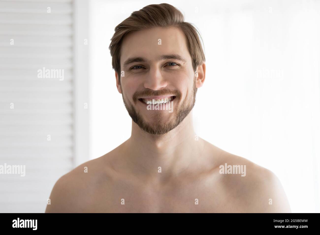 Portrait of happy attractive bearded well built man with stubble Stock ...