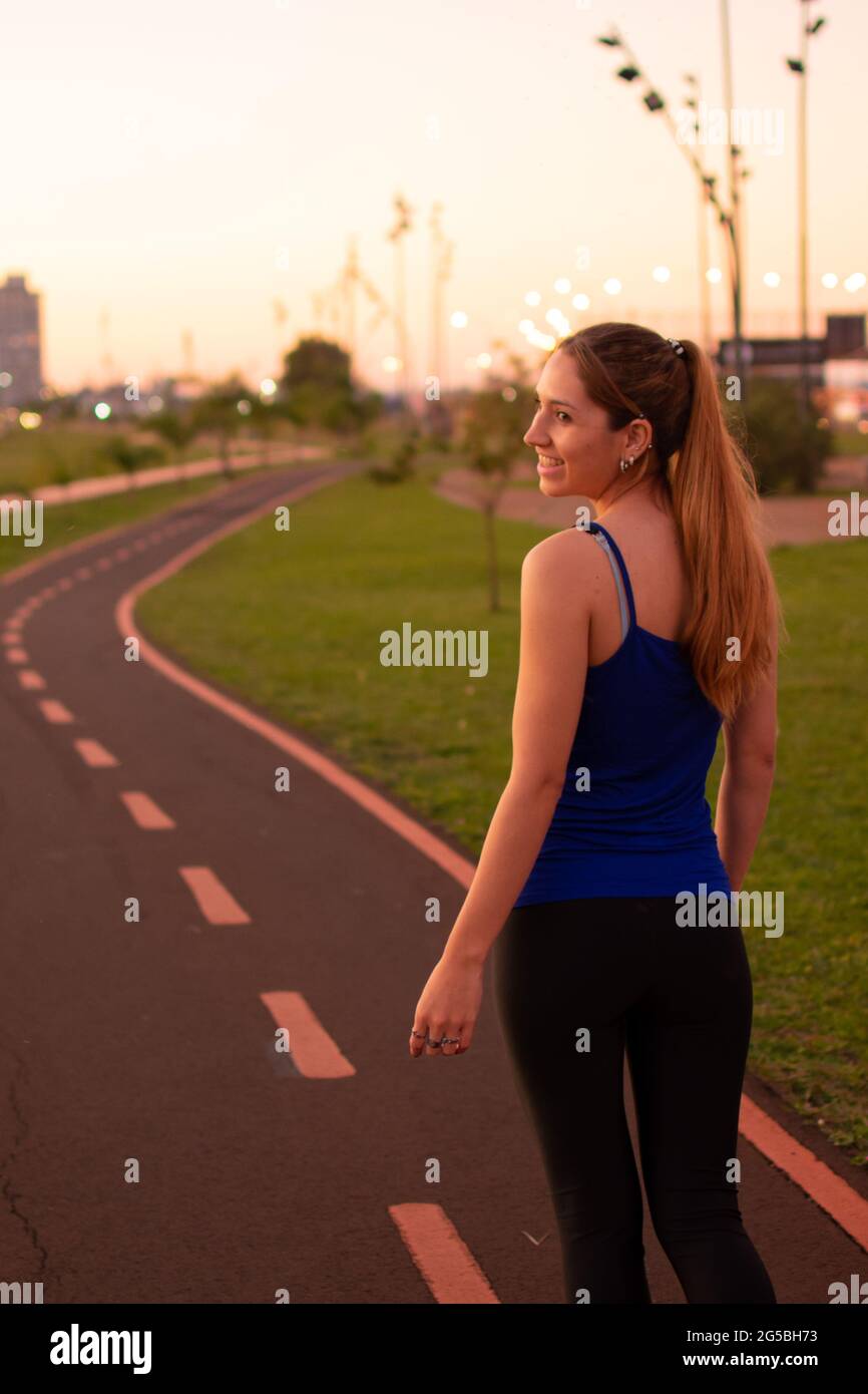 Hispanic female running track hi-res stock photography and images - Alamy