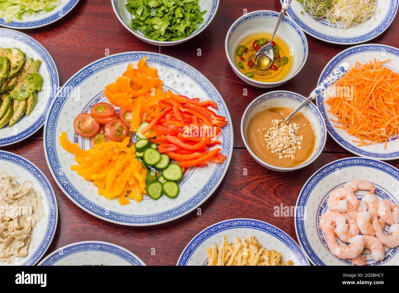 Vegetables, tofu, prawns and sauces for traditional vietnamese cooking ...