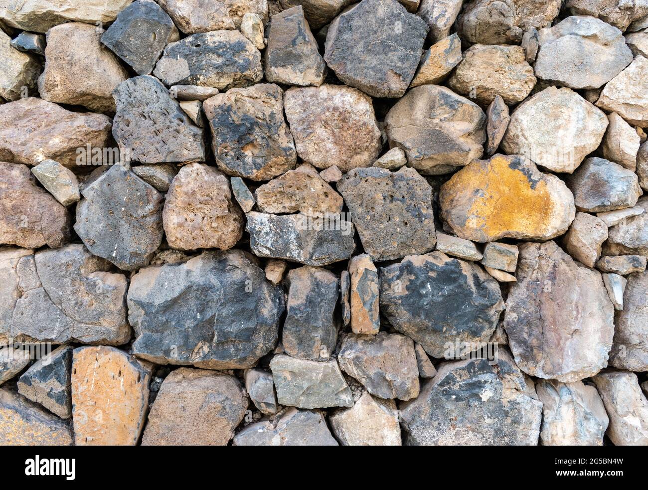 Cobblestone wall texture for backgrounds Stock Photo - Alamy