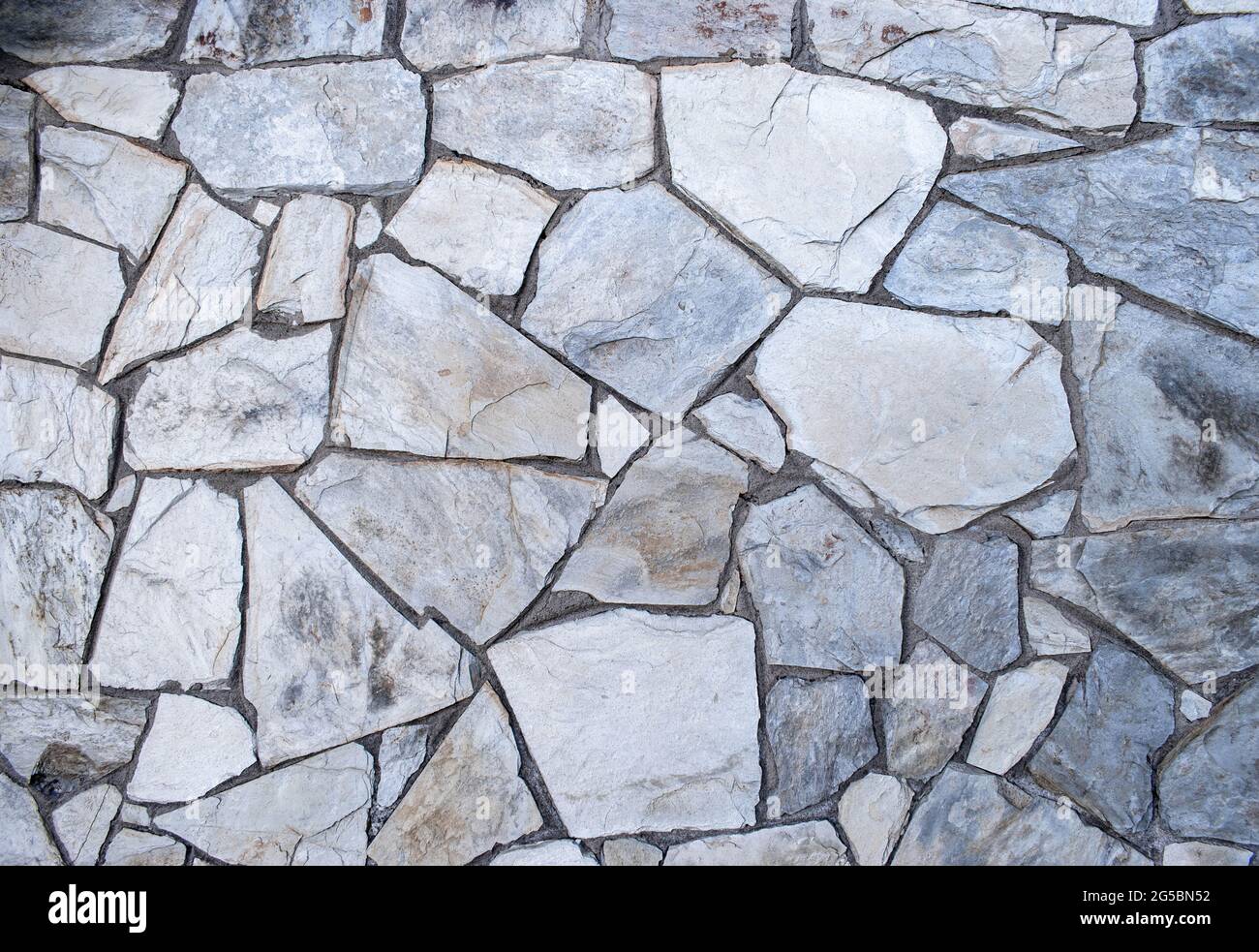 Cobblestone wall texture for backgrounds Stock Photo - Alamy