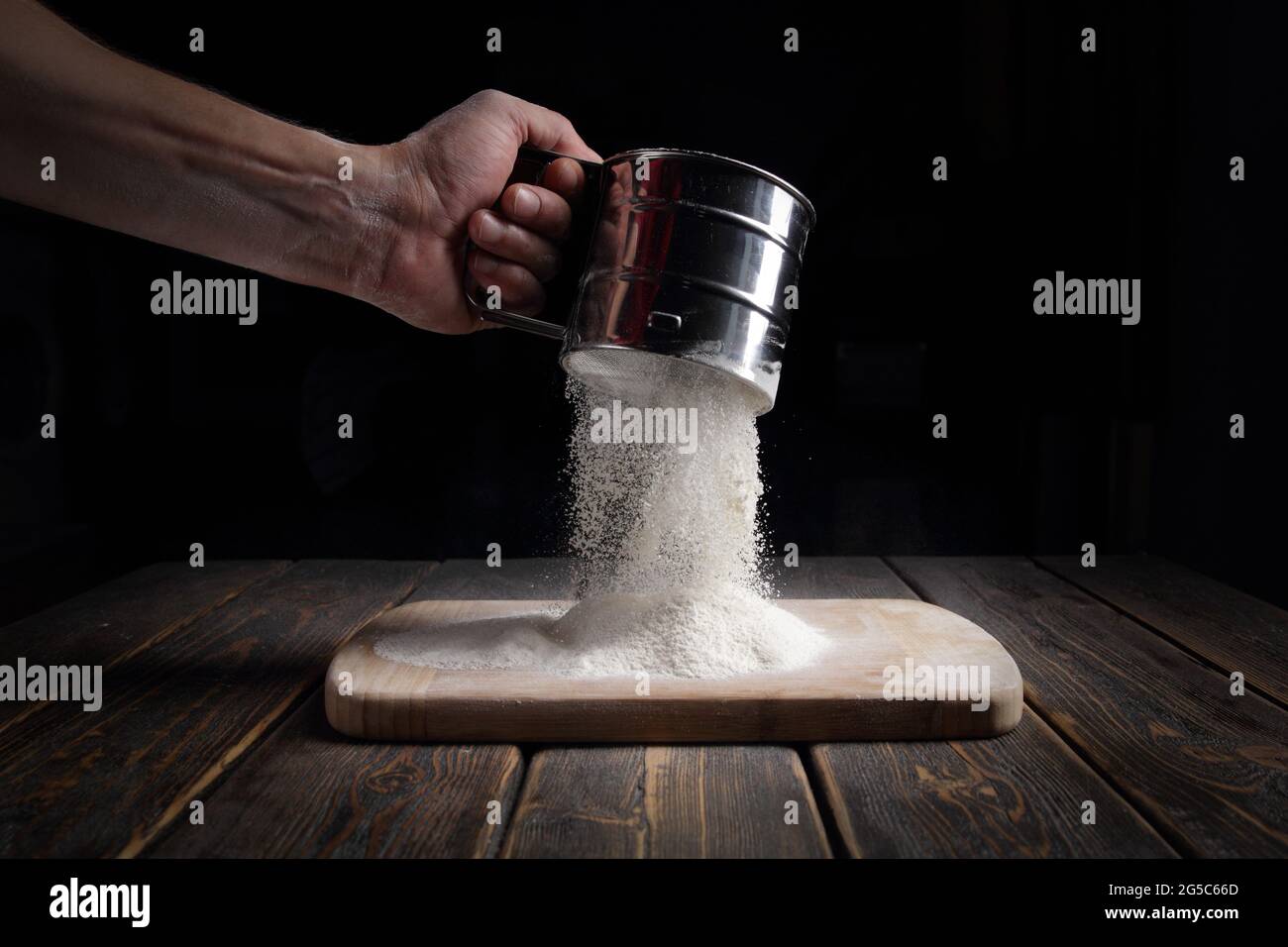 Hand sifts flour through sieve hi-res stock photography and images - Alamy