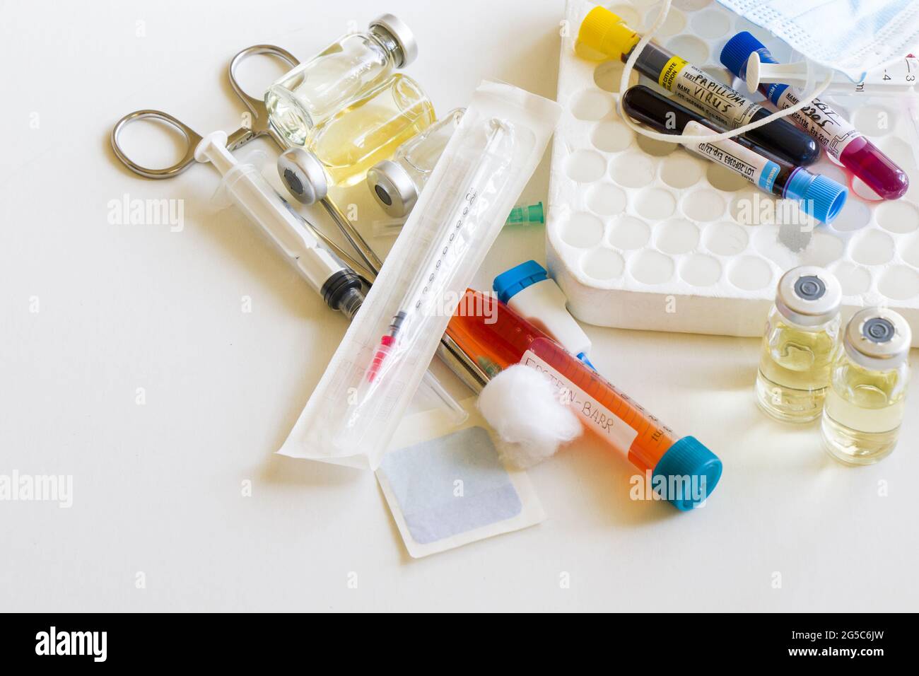 Diagnostic laboratory table with blood test samples and other equipment ...
