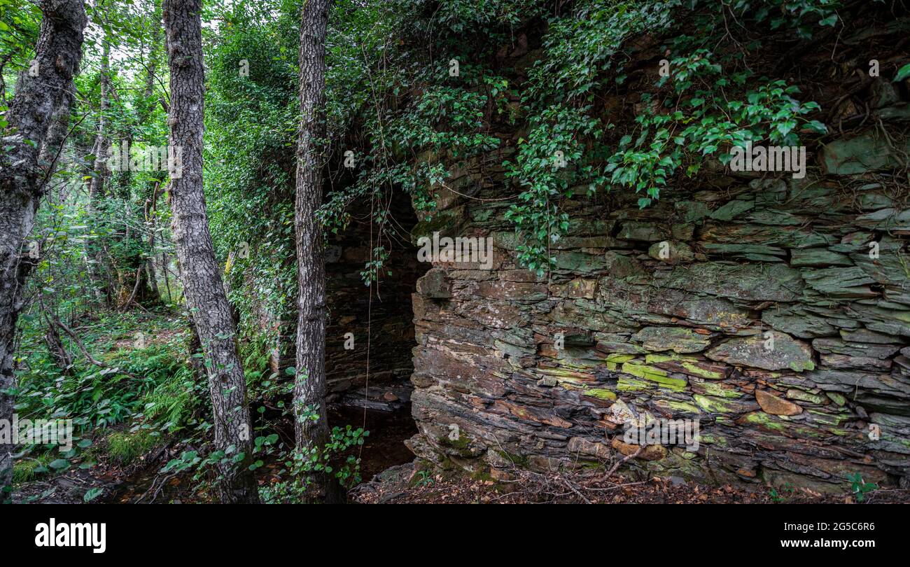 Vintage abandoned stone bridge with small stream Stock Photo - Alamy