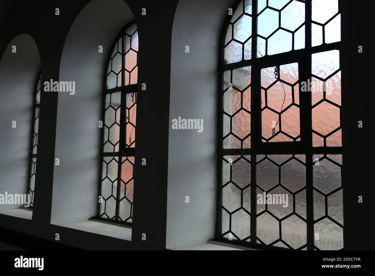 Old barred windows from inside the poorly lit building Stock Photo - Alamy