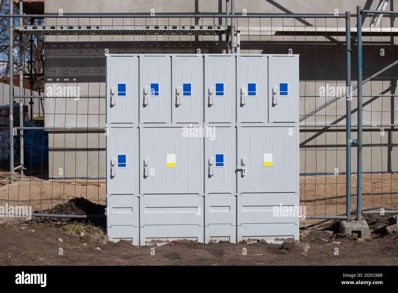 Gray switchboard equipment in front of a building outdoors Stock Photo ...