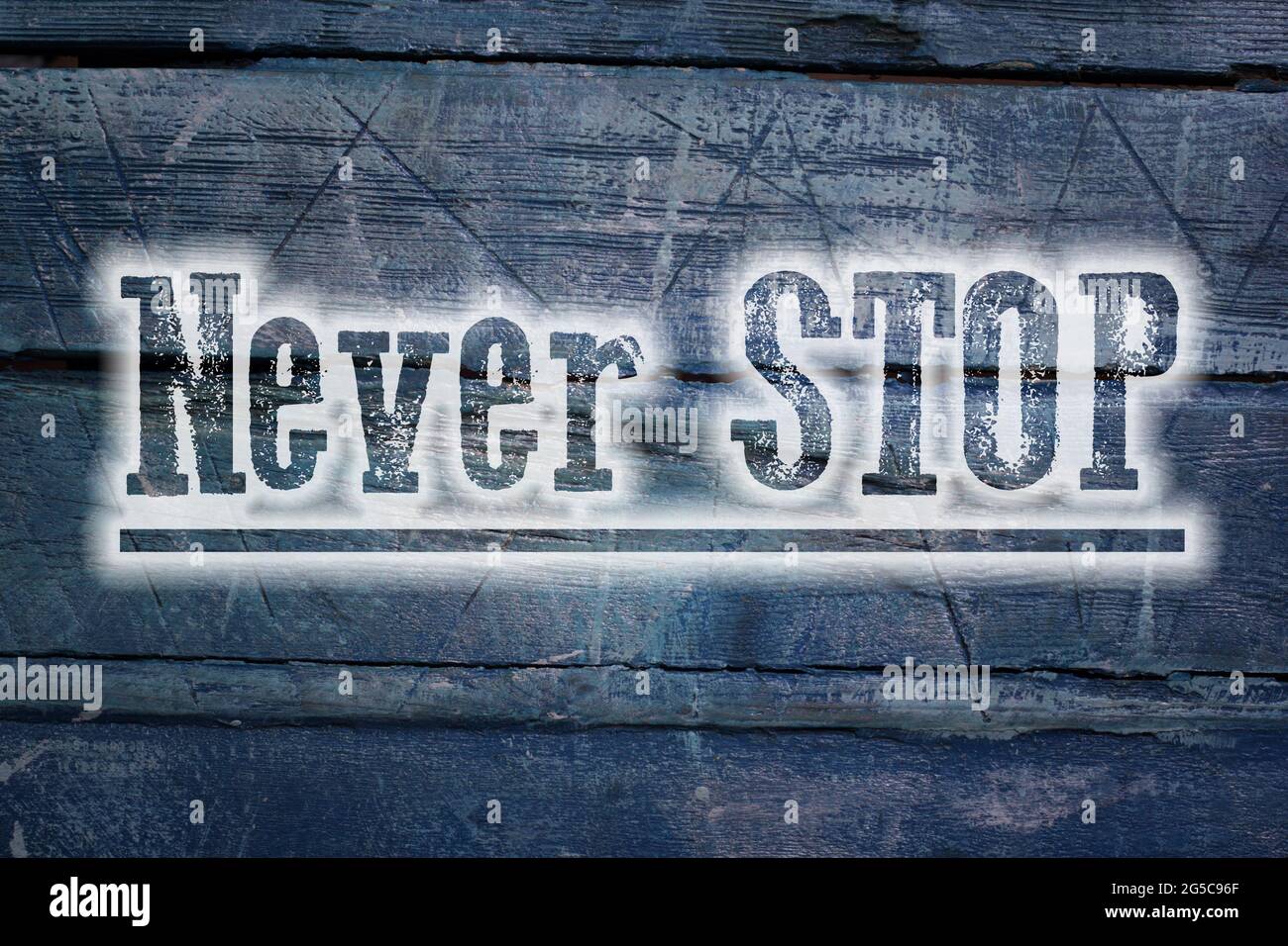 Never Stop Concept text on background Stock Photo - Alamy