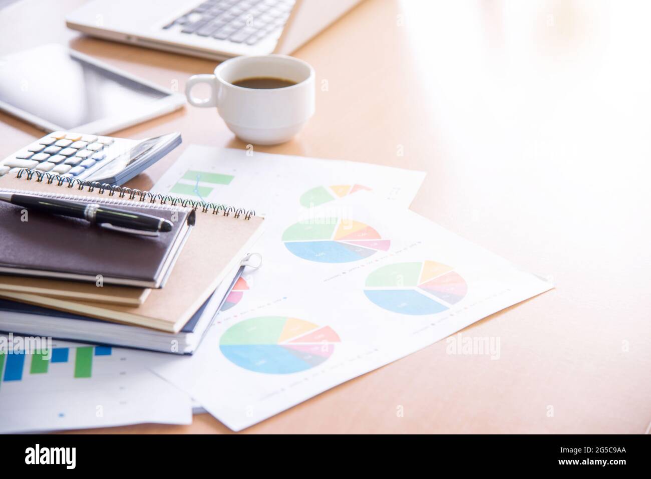 Office desk a stack of paper reports work forms with computer. Modern ...