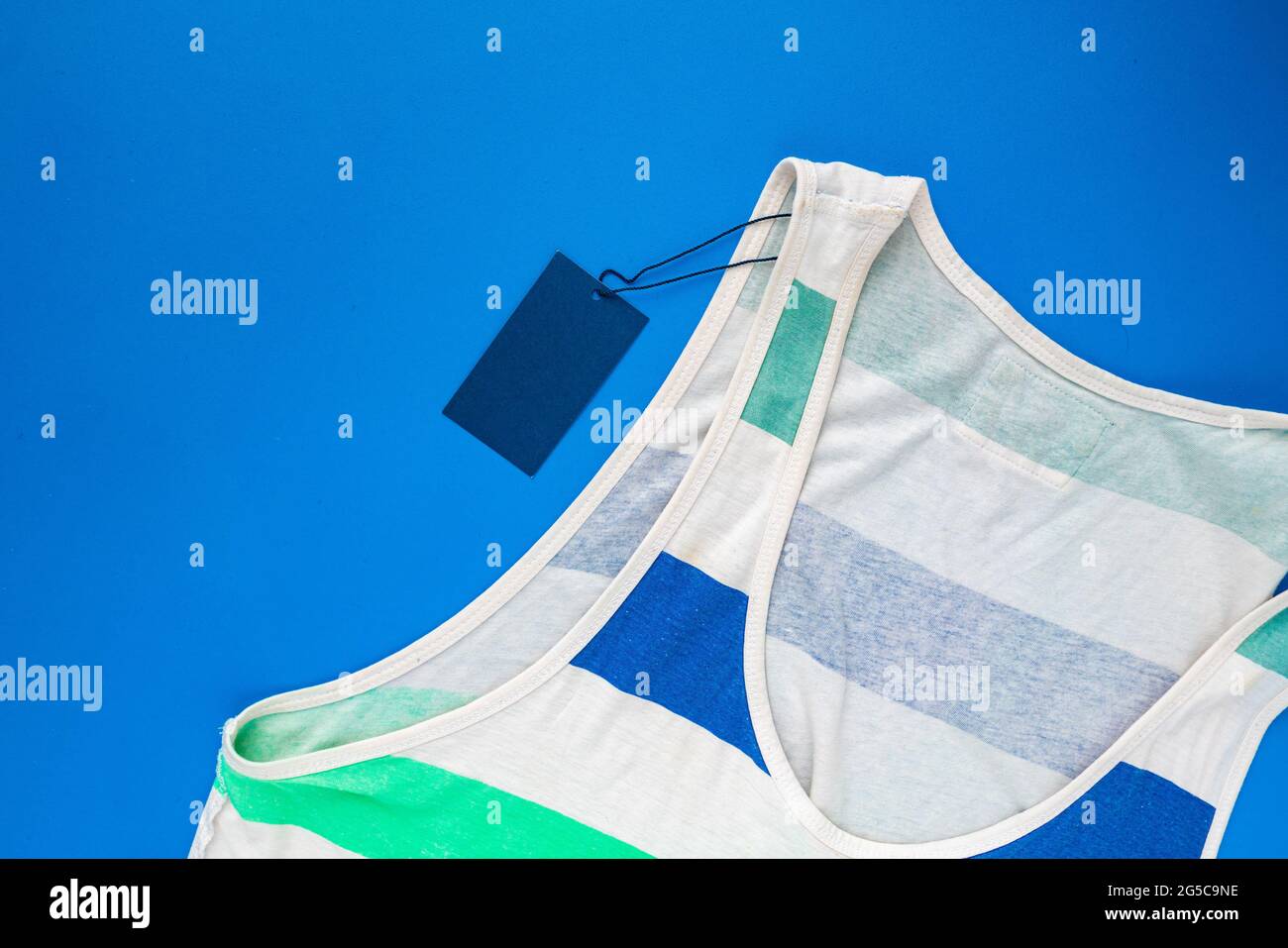 100% natural eco clothes price tag label on the color surface Stock ...