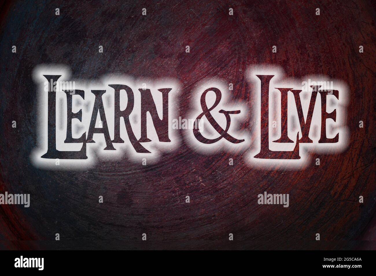 Learn And Live Concept text on background Stock Photo - Alamy