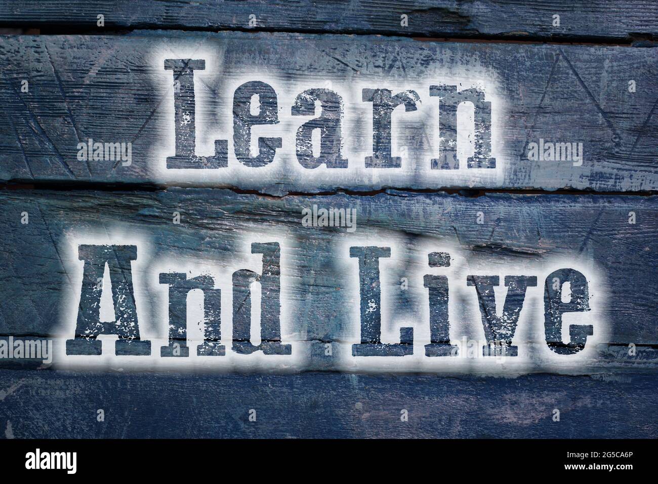 Learn And Live Concept text on background Stock Photo - Alamy