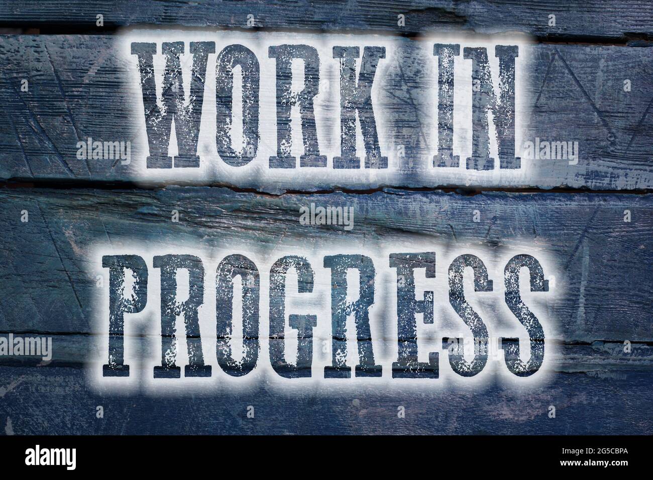 Work In Progress Concept text on background Stock Photo - Alamy