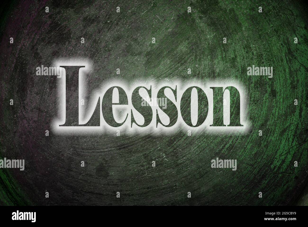 Lesson text on background Stock Photo - Alamy