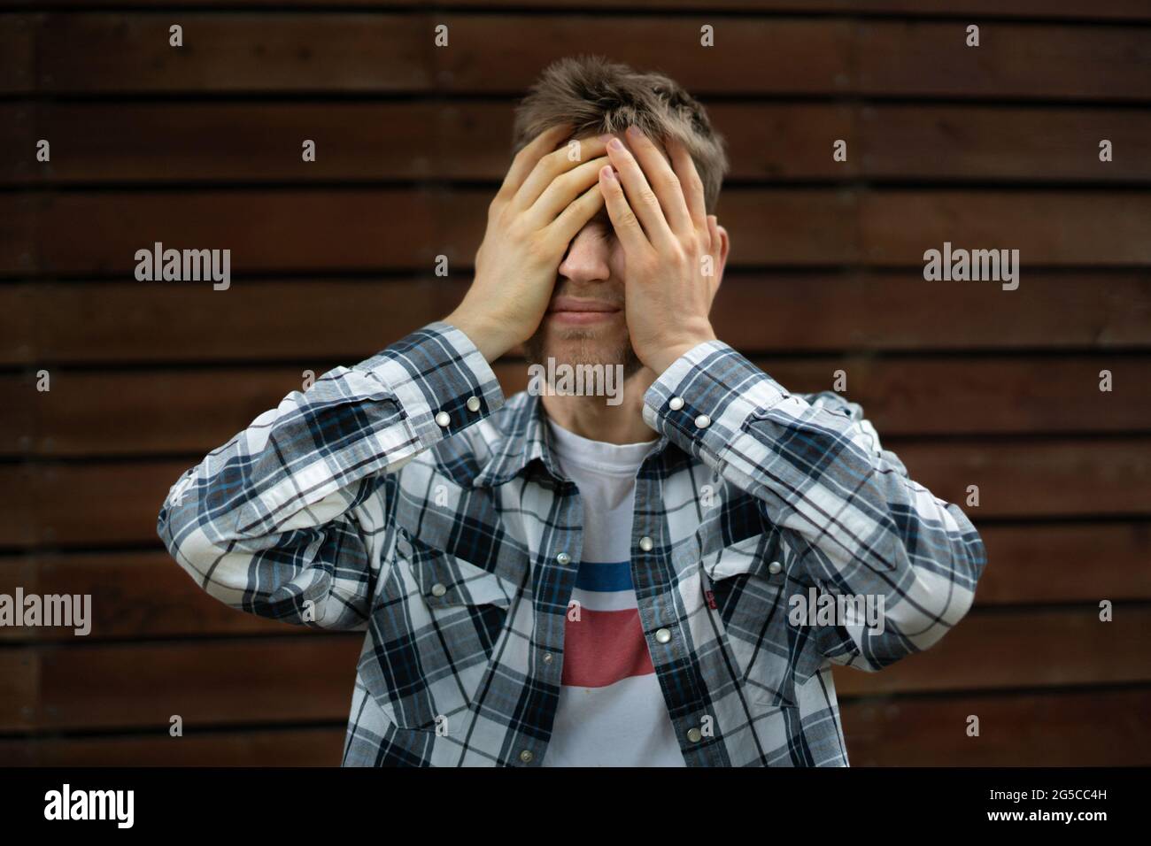 young man facepalm gesture emotion, frustrated man cover the face with ...