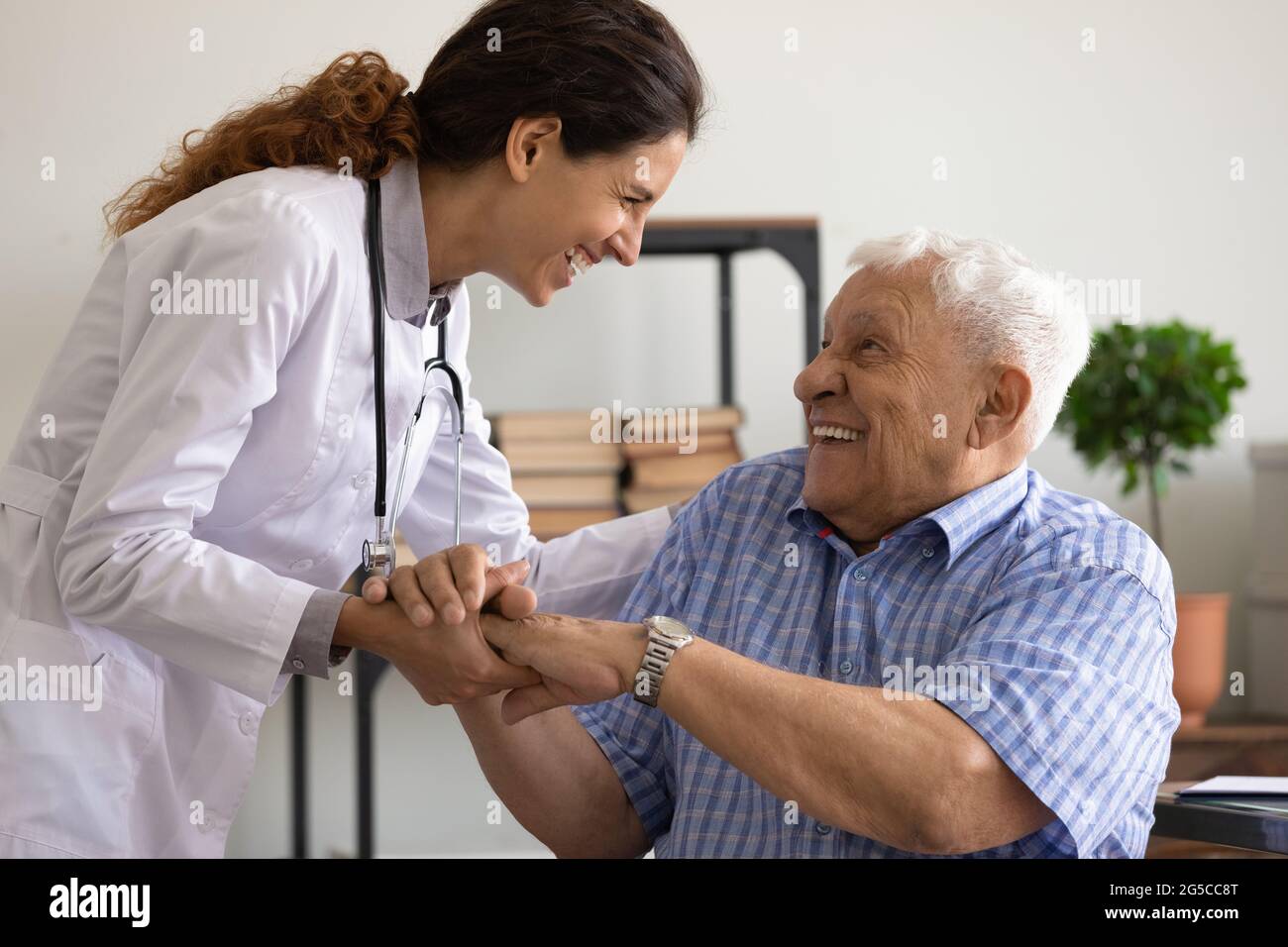 Old person in hospital with doctor hi-res stock photography and images ...
