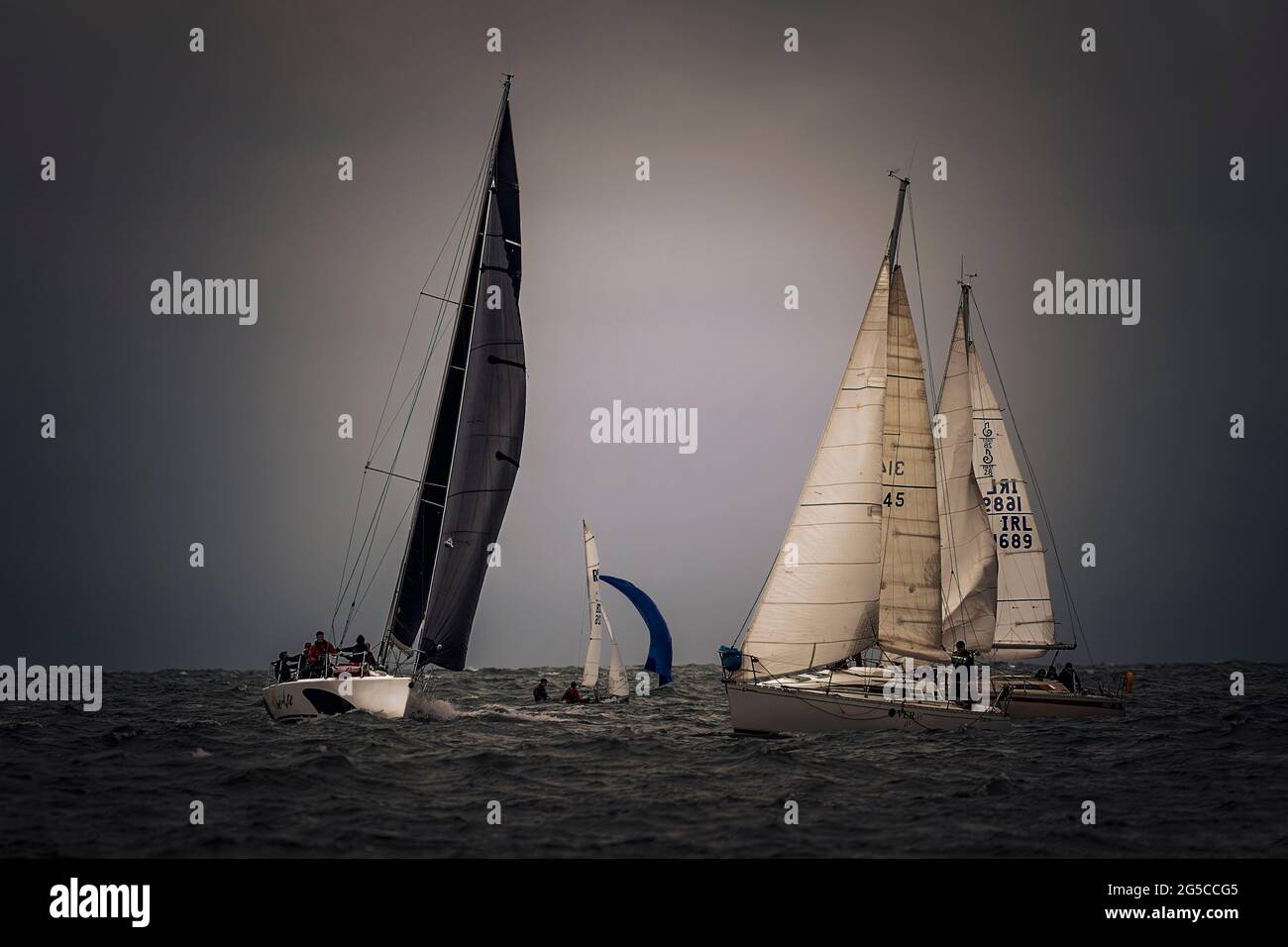 Sailing together. Group of sailboats sails during sail club regatta in ...