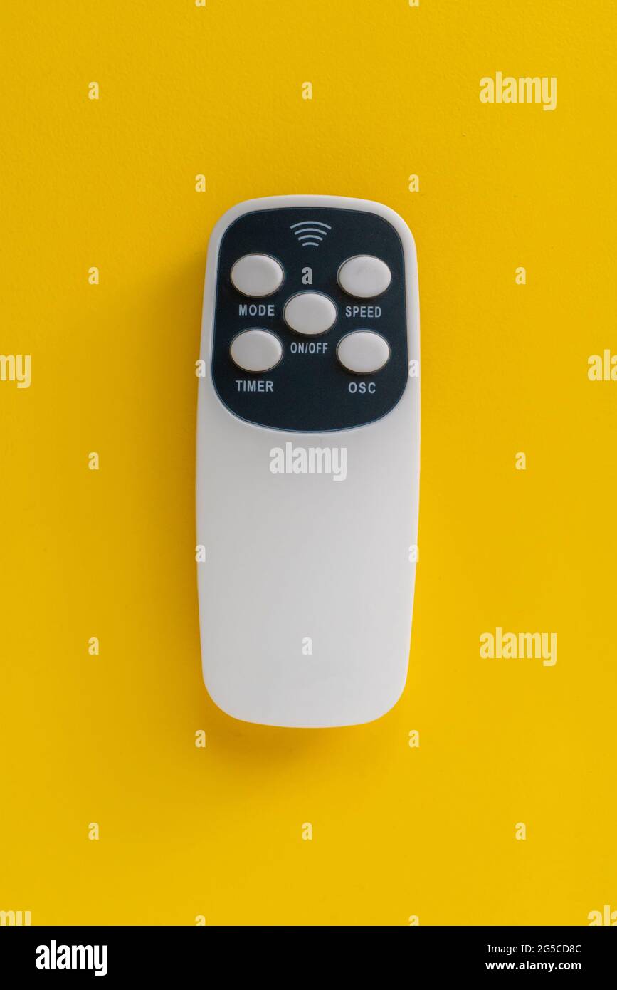 simple remote wireless controlle on color background isolated top view ...