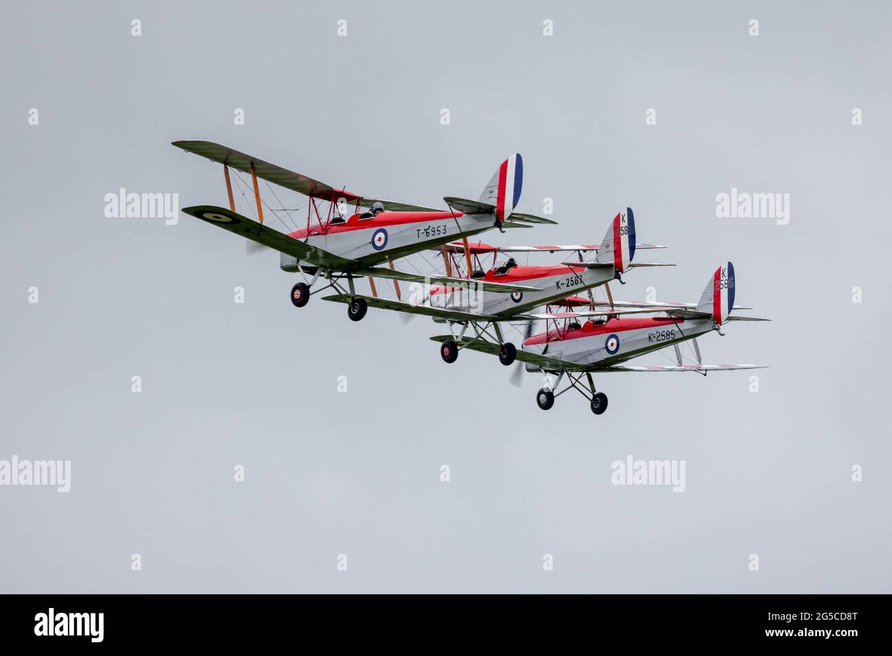 Three RAF Central Flying School marked Tiger Moths airborne at ...