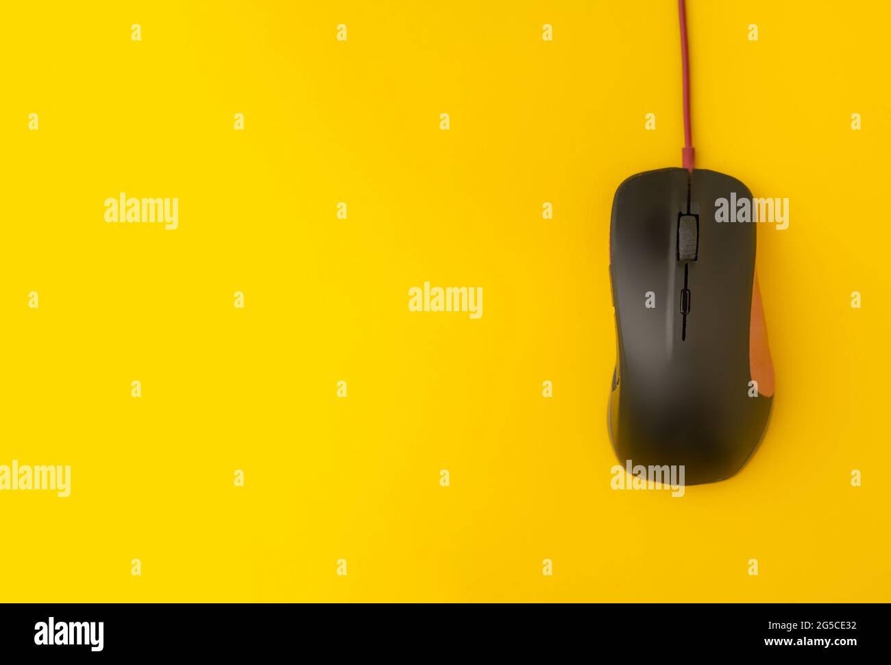 top view of the simple computer mouse on the color background with copy ...