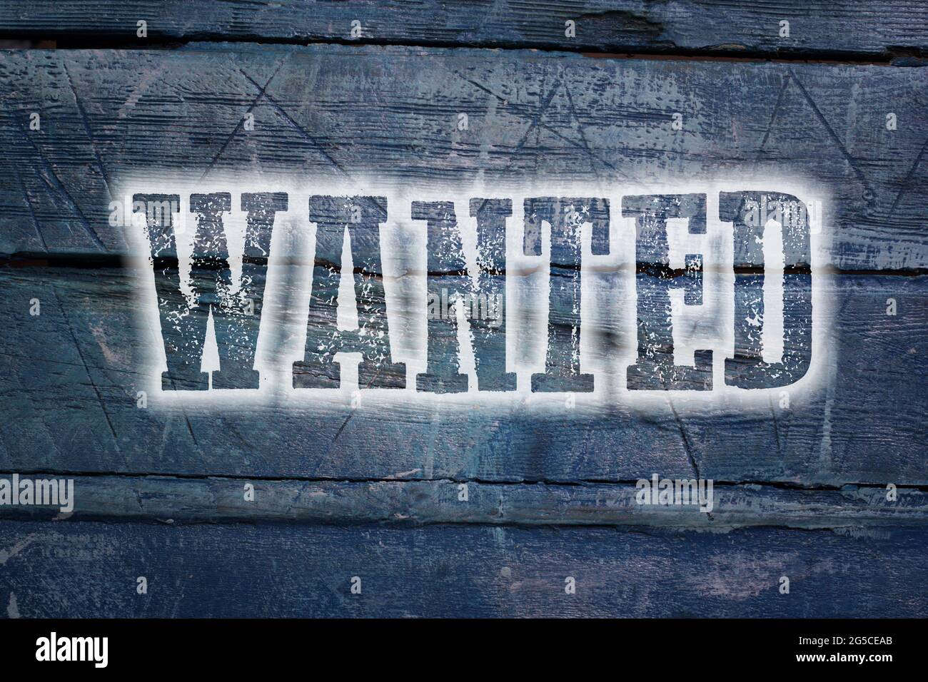 Wanted Concept text on background Stock Photo - Alamy