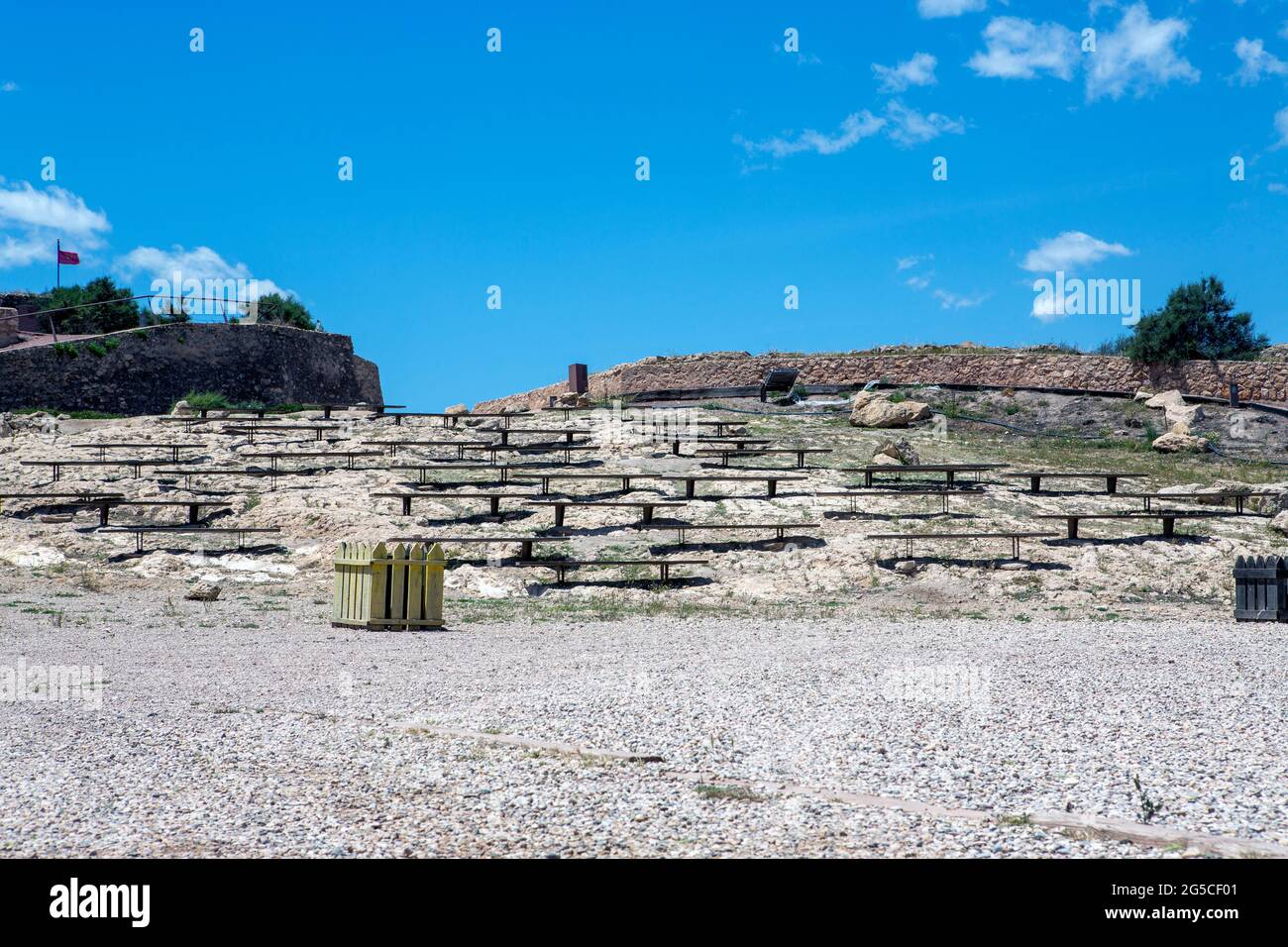 outdoor performance area with wooden benches at different heights in ...
