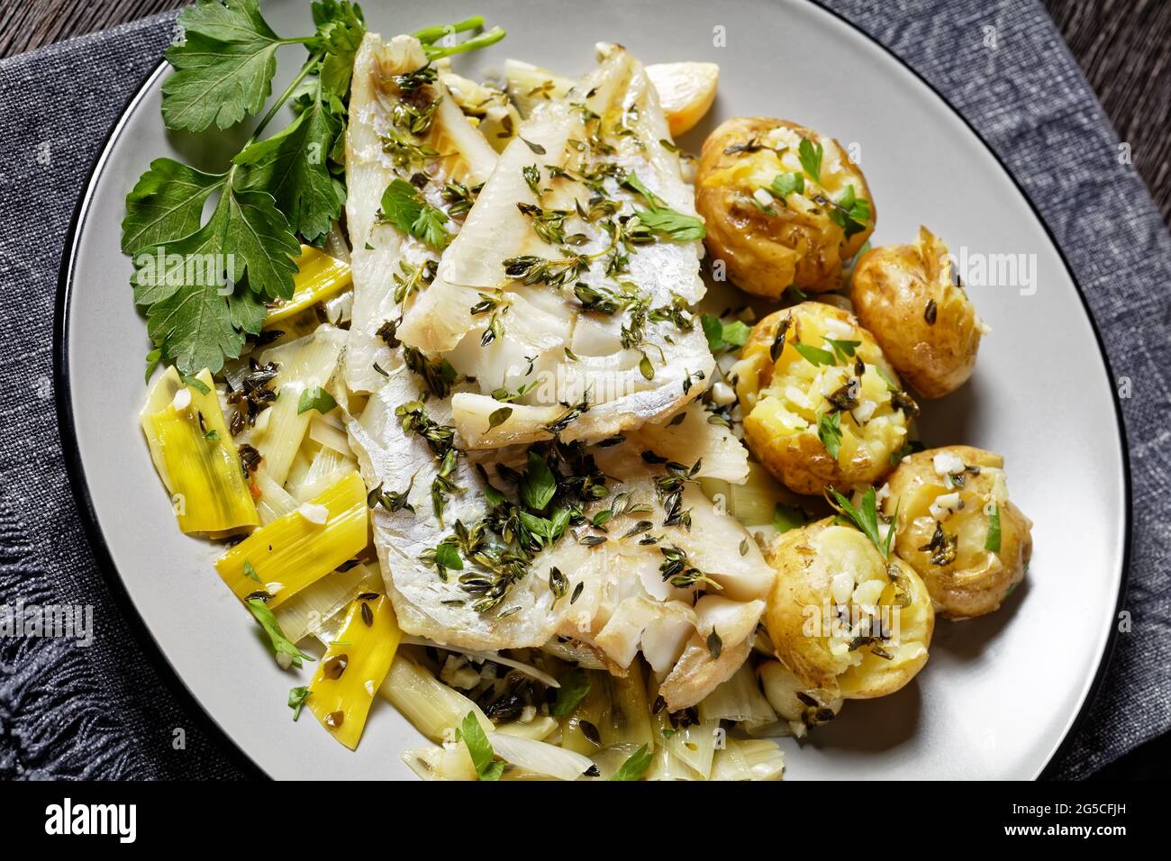 White fish fillets new potatoes hi-res stock photography and images - Alamy