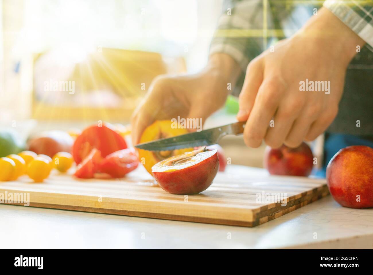 cook hand cutting the fruits and vegetables rich of vitamins Stock ...