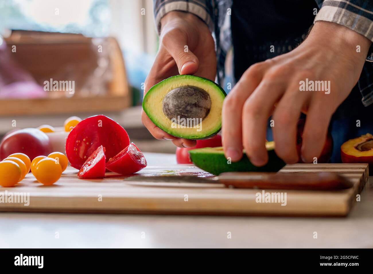 cook hand cutting the fruits and vegetables rich of vitamins Stock ...