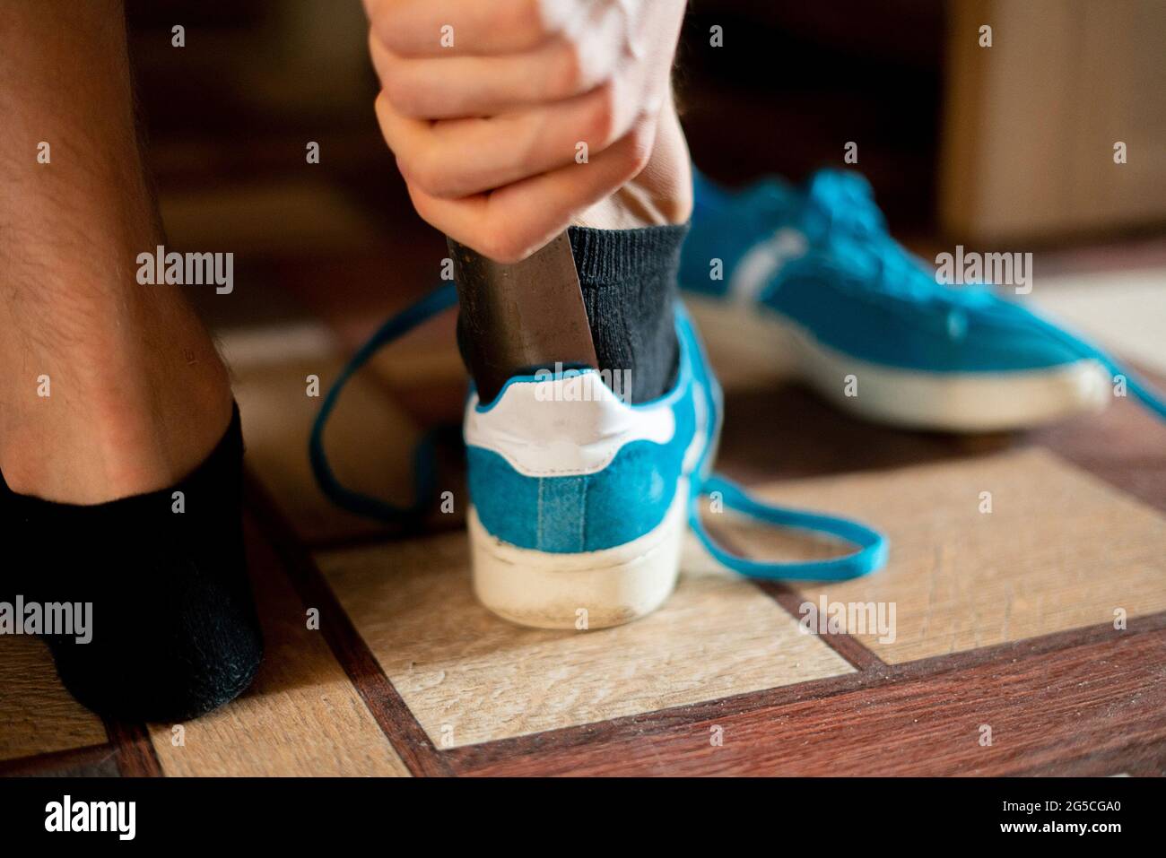 Putting on socks elderly hi-res stock photography and images - Alamy