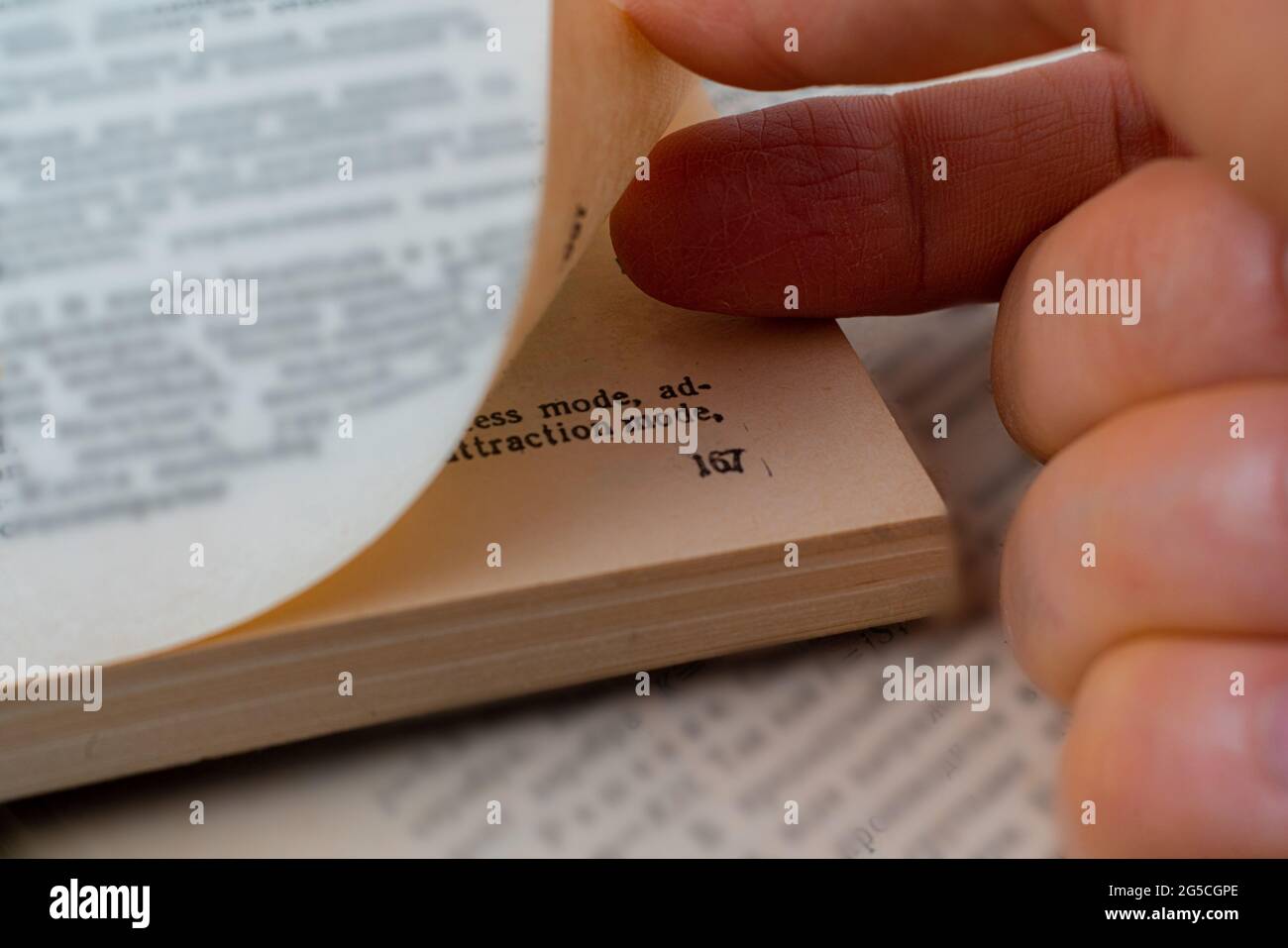 Turning next page hi-res stock photography and images - Alamy