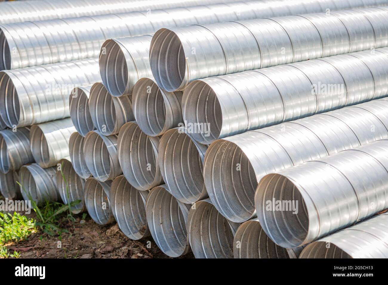 Ventilation pipe warehouse. Steel pipes, parts for the construction of ...