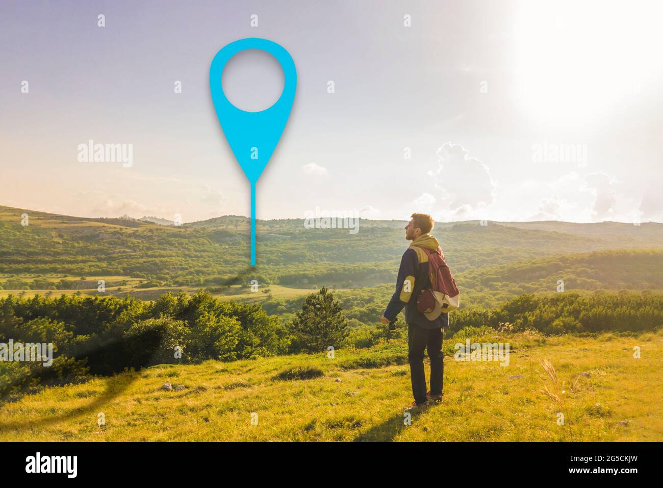 a tourist hiking outdoor on nature landscape with a land mark point of ...