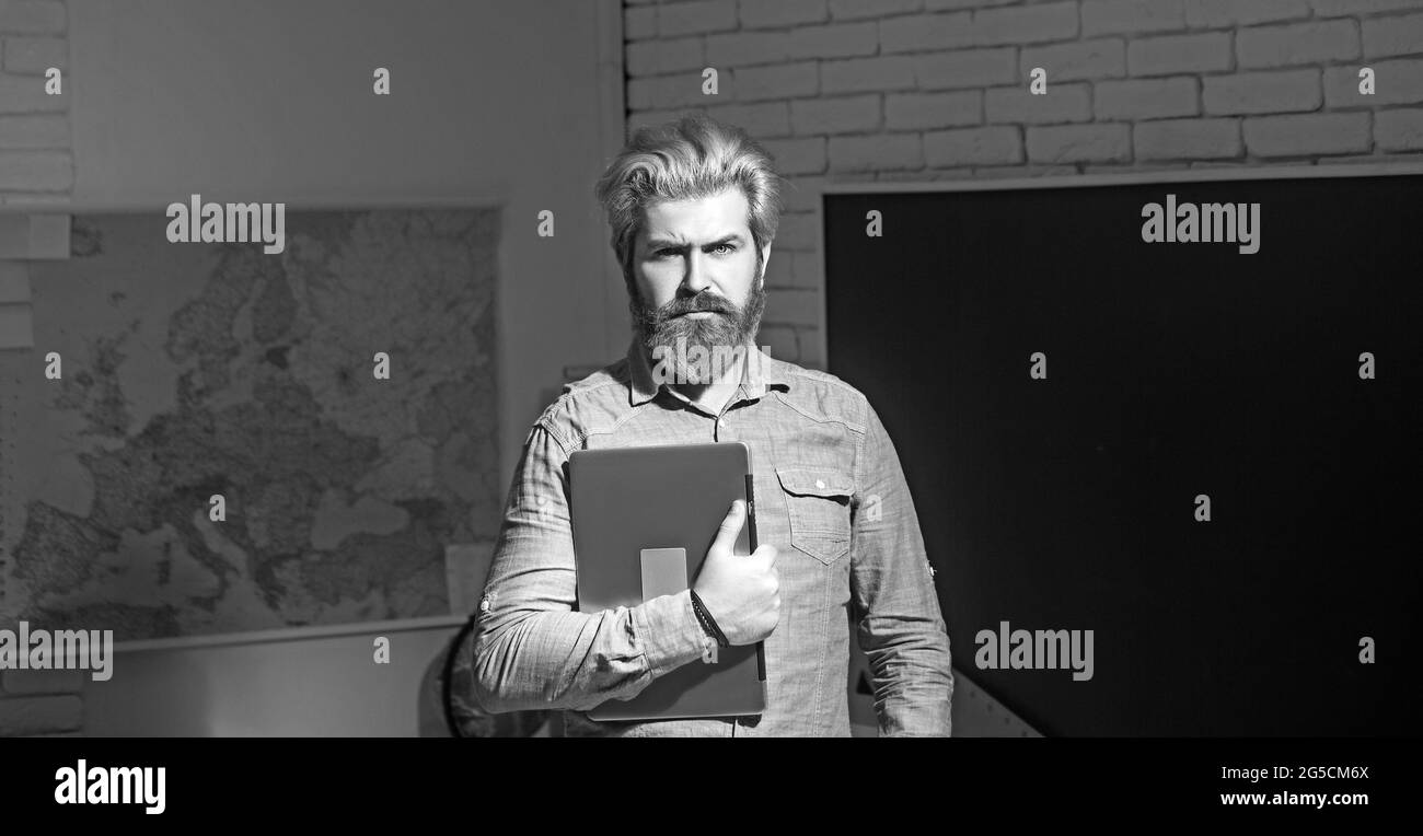 Teacher using laptop in Black and White Stock Photos & Images - Alamy