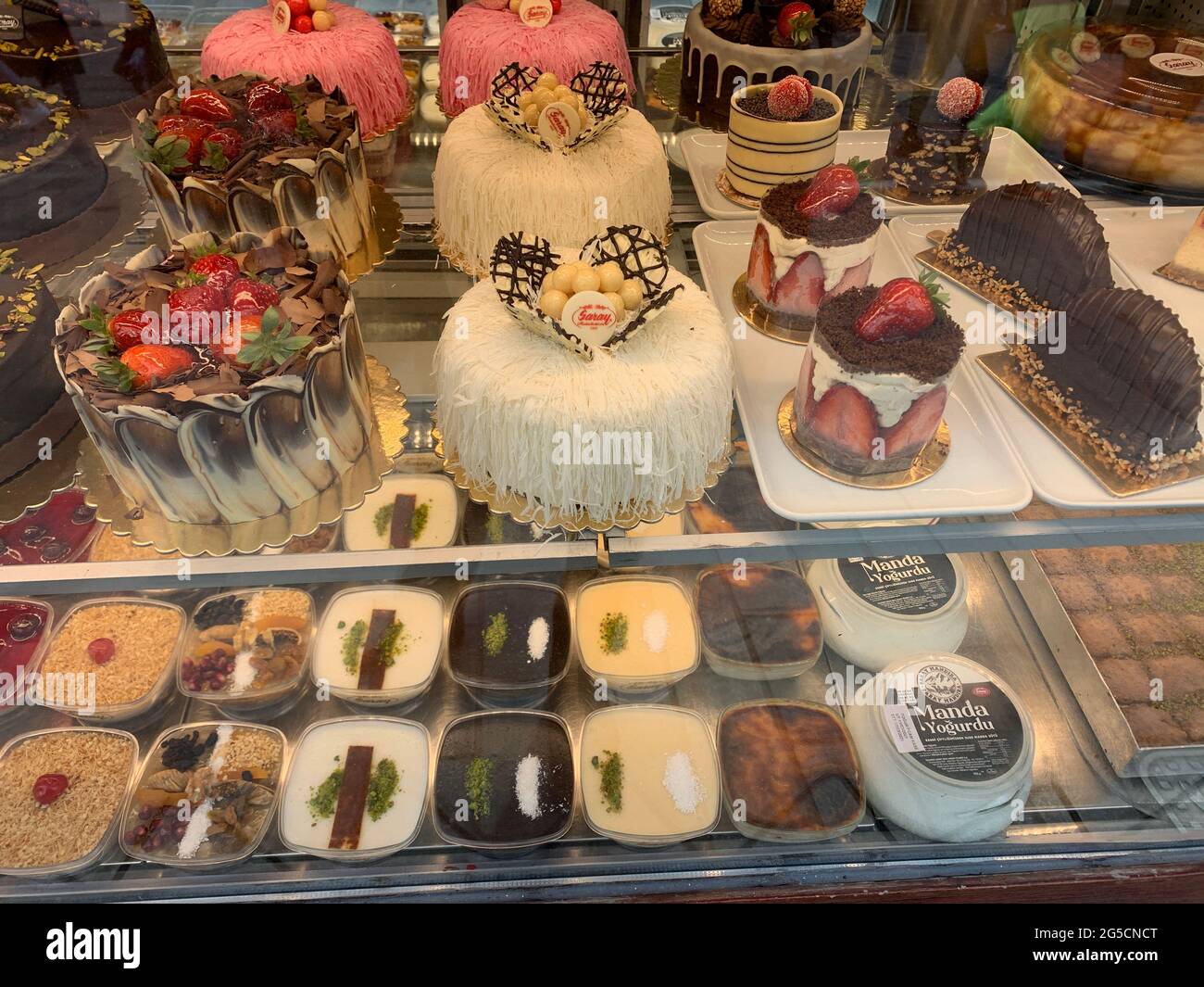 Window of bakery shop. Different cakes Stock Photo - Alamy