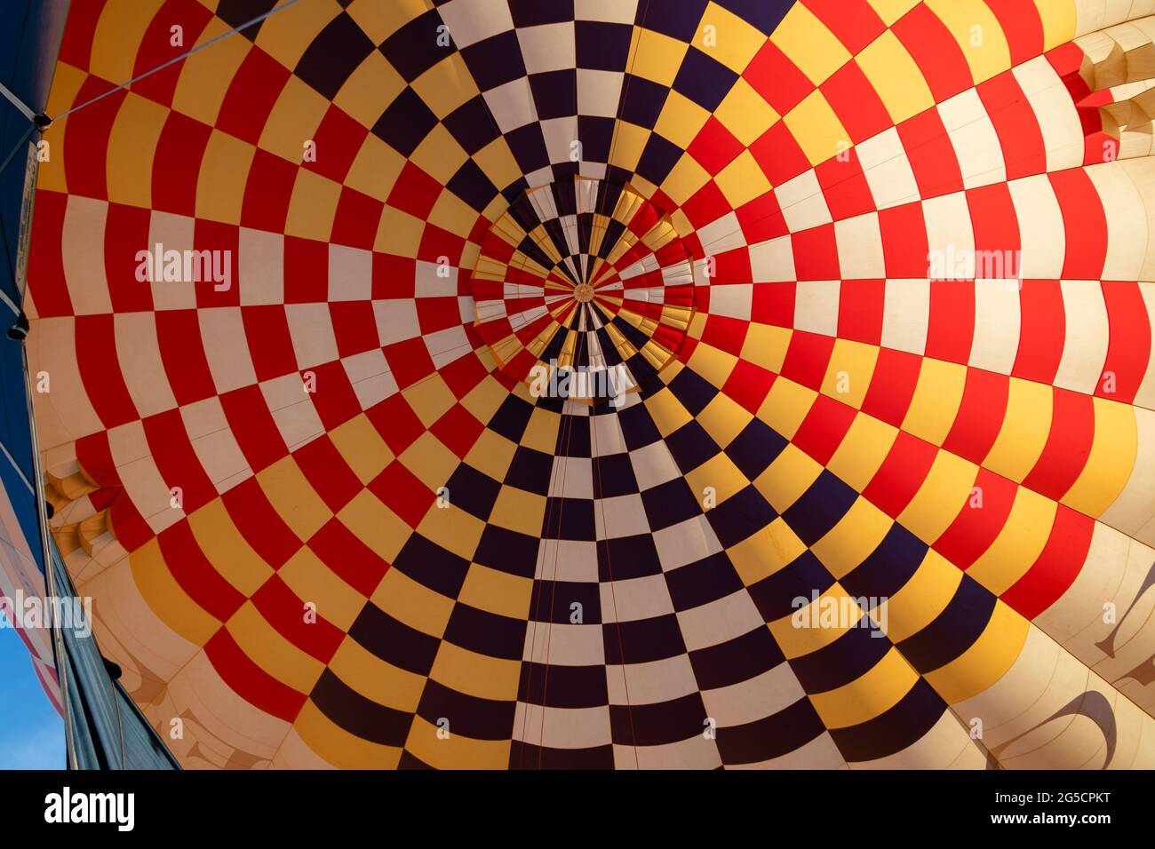 Colorful sail in a hot air balloon seen from the inside, from below ...
