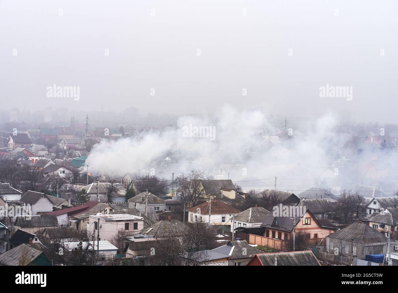 Top view of the area in which a residential building is on fire. Fire ...