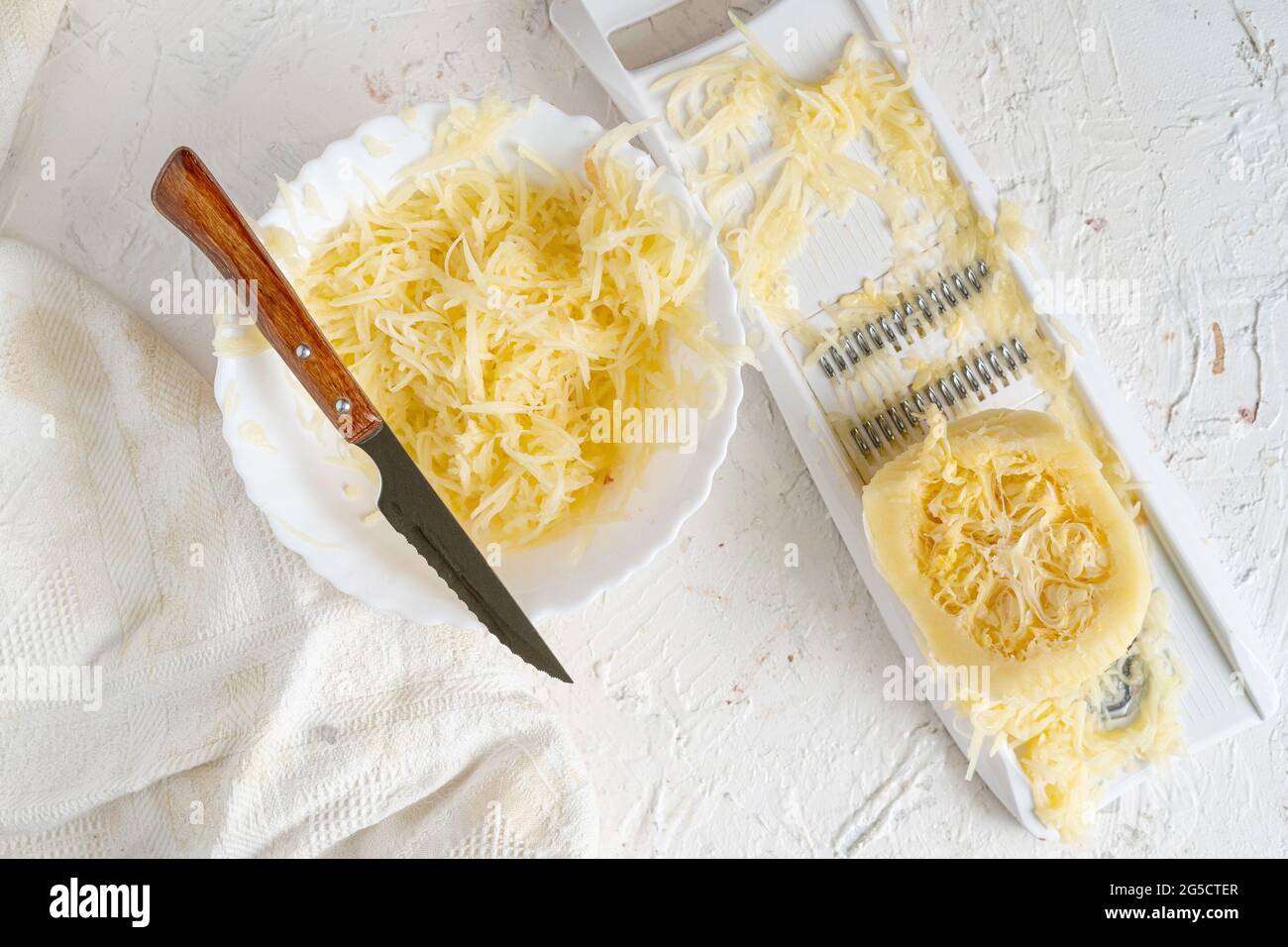 process of making and cooking the cut zucchini pasta spaghetti on the ...