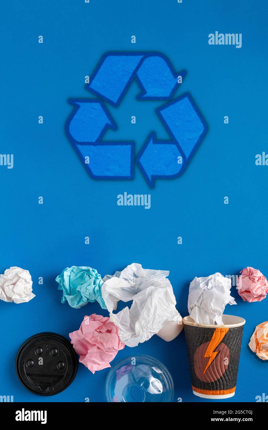 symbol or icon of recycling, top view flat lay with some garbage Stock ...