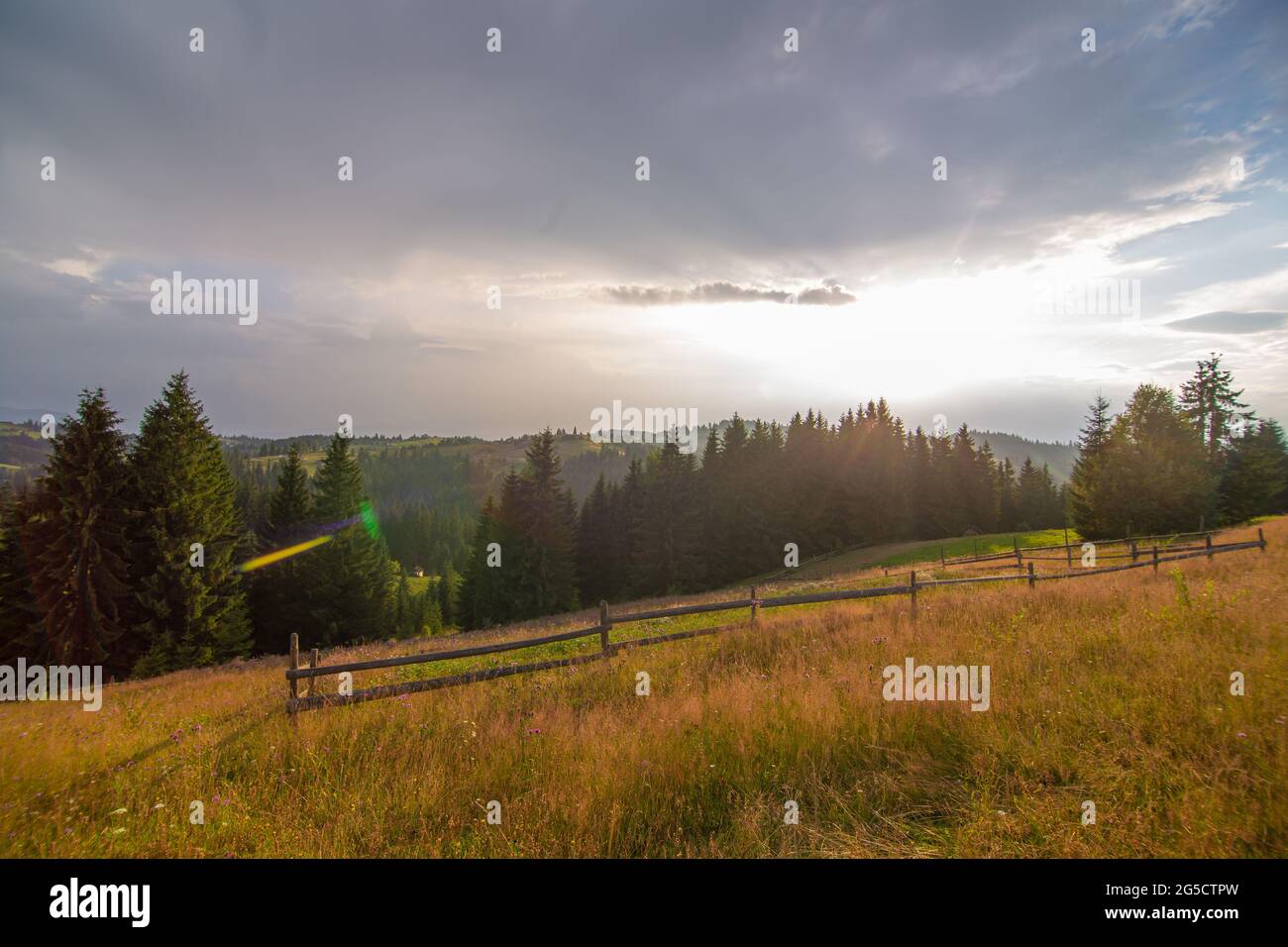 Mountain hills pure nature rural landscape. Fence from wooden logs ...