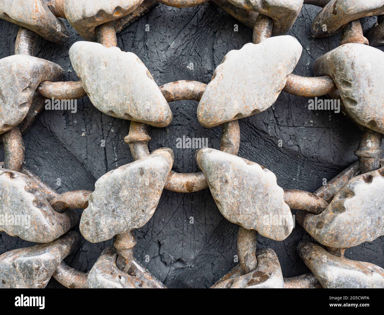 Wheel chains of a bulldozer tyre close-up. Concept road construction ...