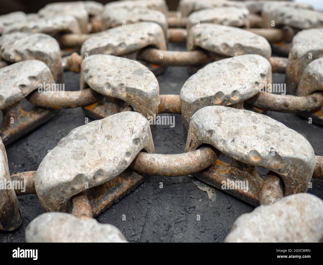 Machinerydetail, chain wheel of heavy bulldozer or excavator in open ...