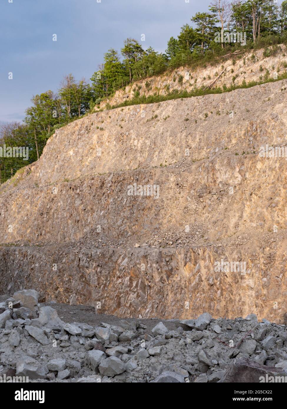 Detail of a stone pit in stone quarry. Industrial site, granite gravel ...