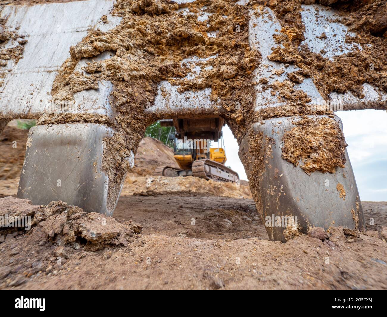 Detailed steel teeth of excavator bucket. Scarry bucket teeth ...